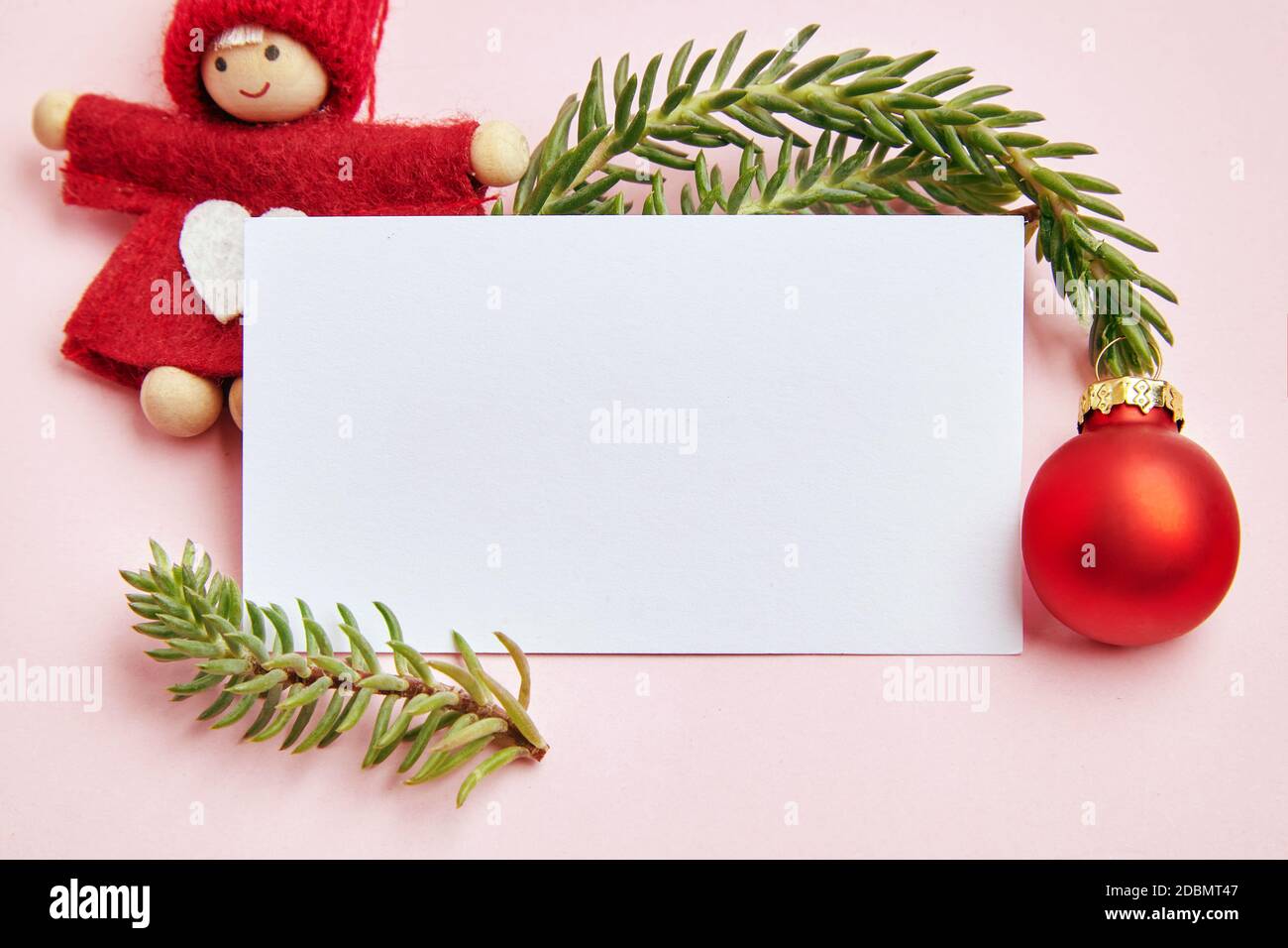 New year greeting card on the rose background Stock Photo - Alamy