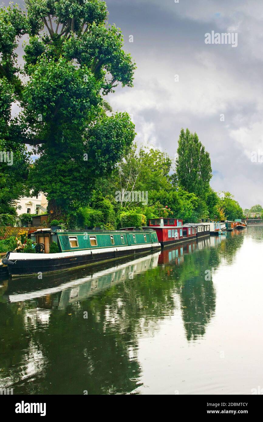 Big channel way with long narrow boats Stock Photo - Alamy