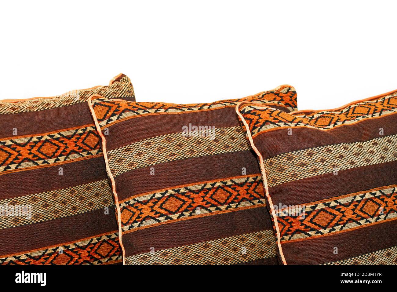 Three pillows in line isolated on white Stock Photo - Alamy