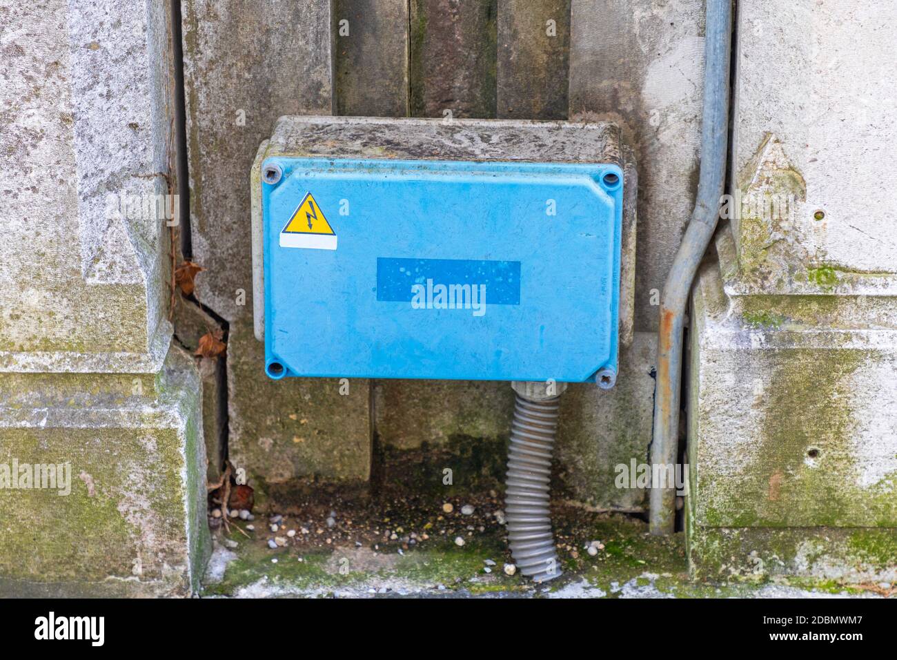 Blue Electric Power Box at Exterior Wall Stock Photo - Alamy