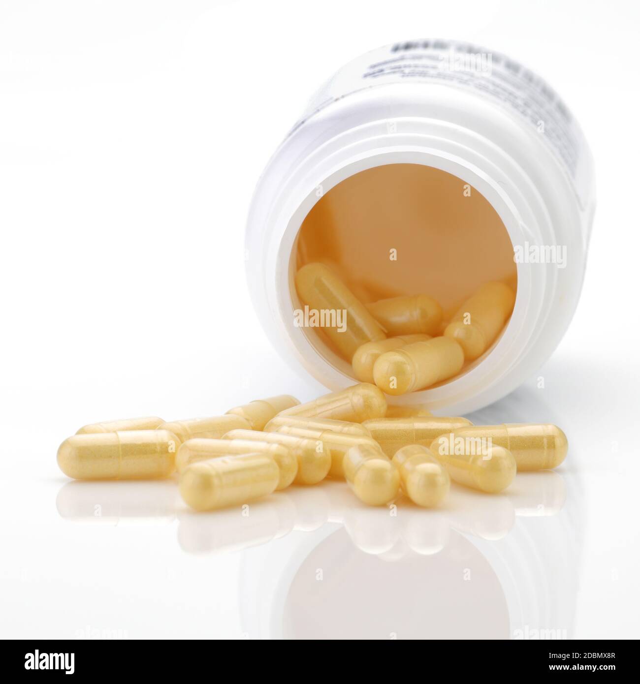 A pile of capsual pills and medication bottle Stock Photo - Alamy