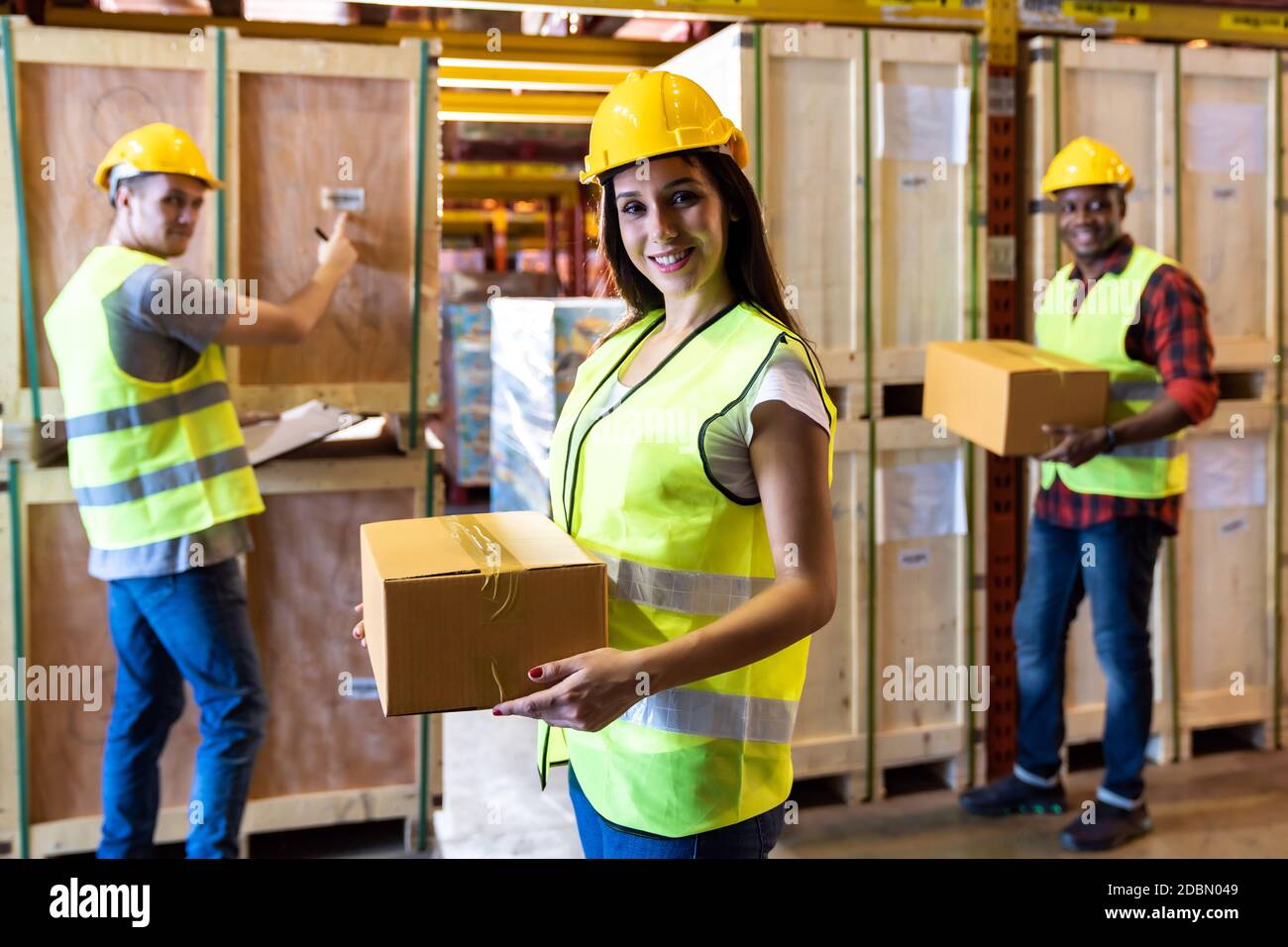 Portrait of caucasian white woman warehouse worker hold parcel box with ...