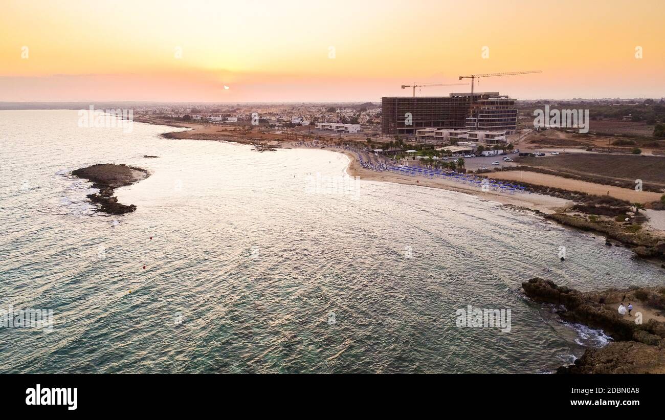 Aerial view of coastline sunset and landmark beach of Agia Thekla, Ayia ...