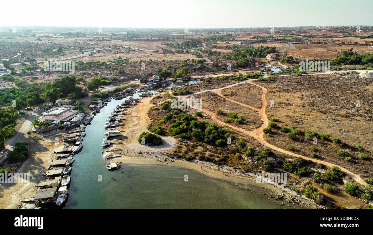 Aerial bird's eye view of Liopetri river to the sea (potamos Liopetriou ...