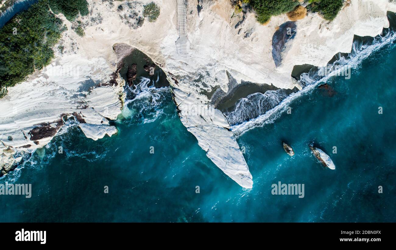 Aerial view of landmark big white chalk rock at Governor's beach ...
