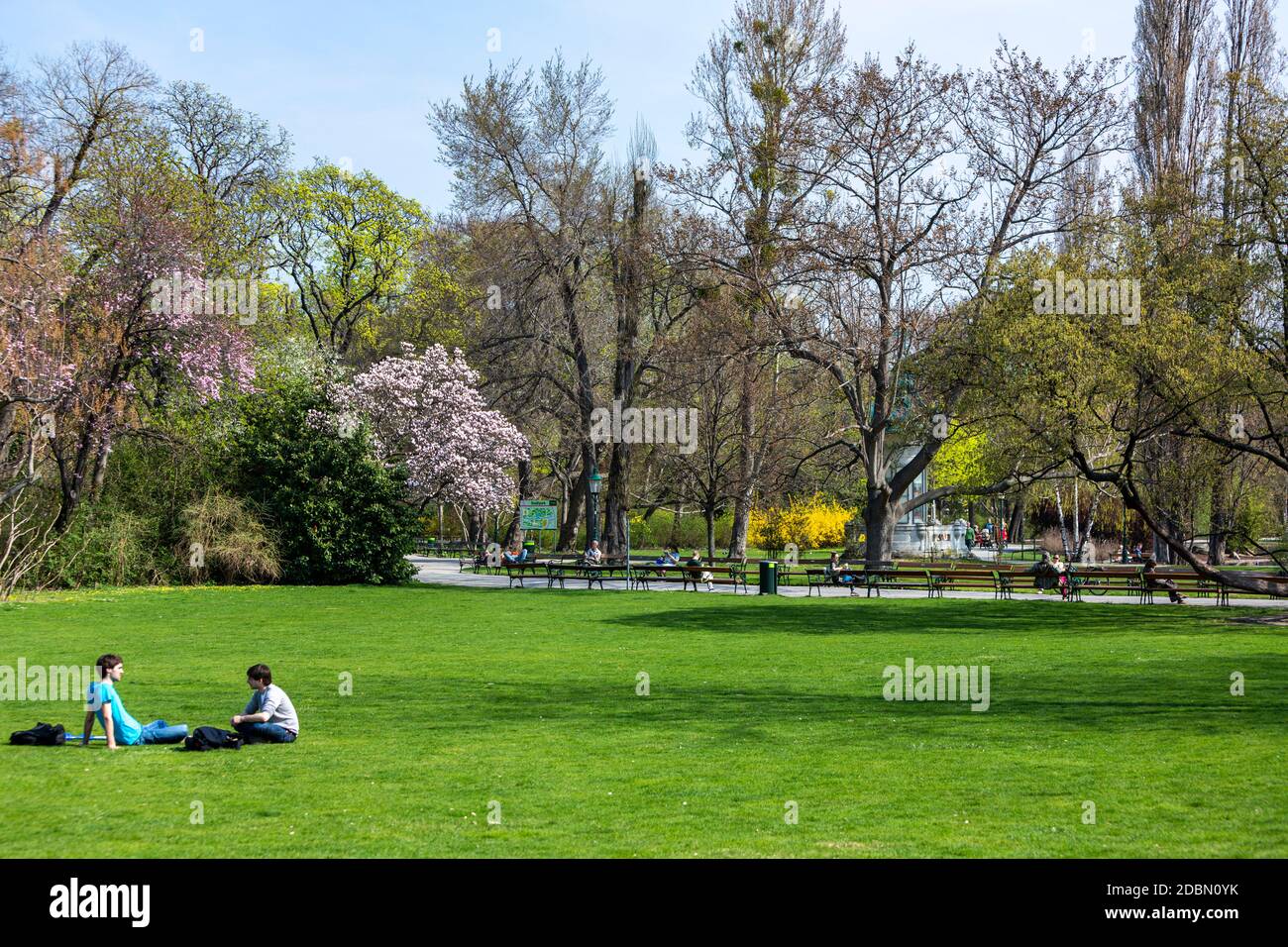 People seated in lawn in Stadtpark, Vienna, Austria Stock Photo - Alamy