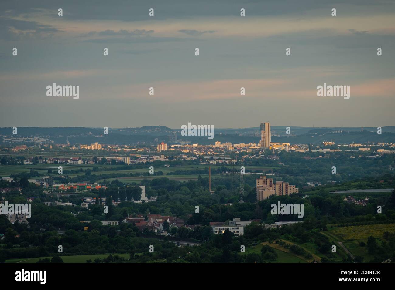 German cityscape with skyscraper and dark clouds in dawn Stock Photo ...