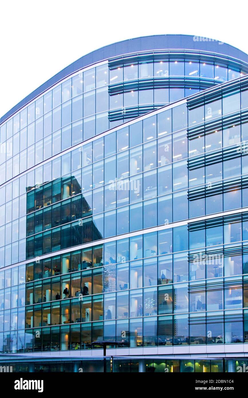 Side view of blue office building reflections Stock Photo - Alamy