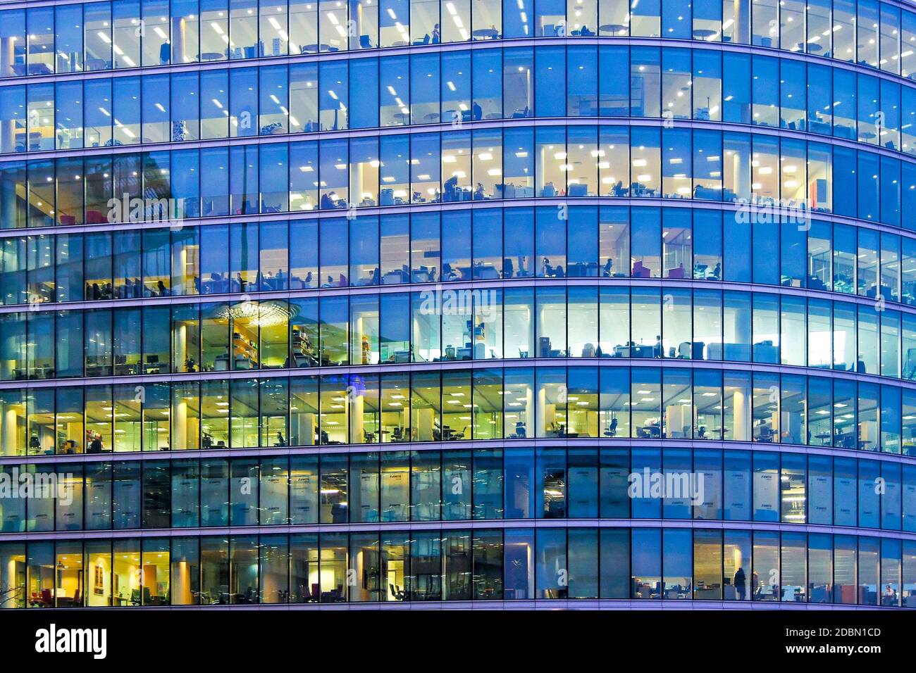 Side view of blue glass corporate building Stock Photo - Alamy