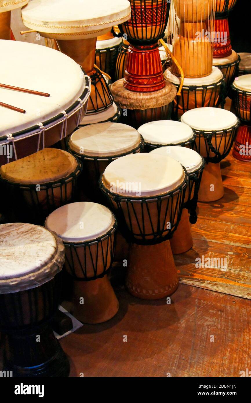 Bunch of traditional hand made leather drums Stock Photo - Alamy