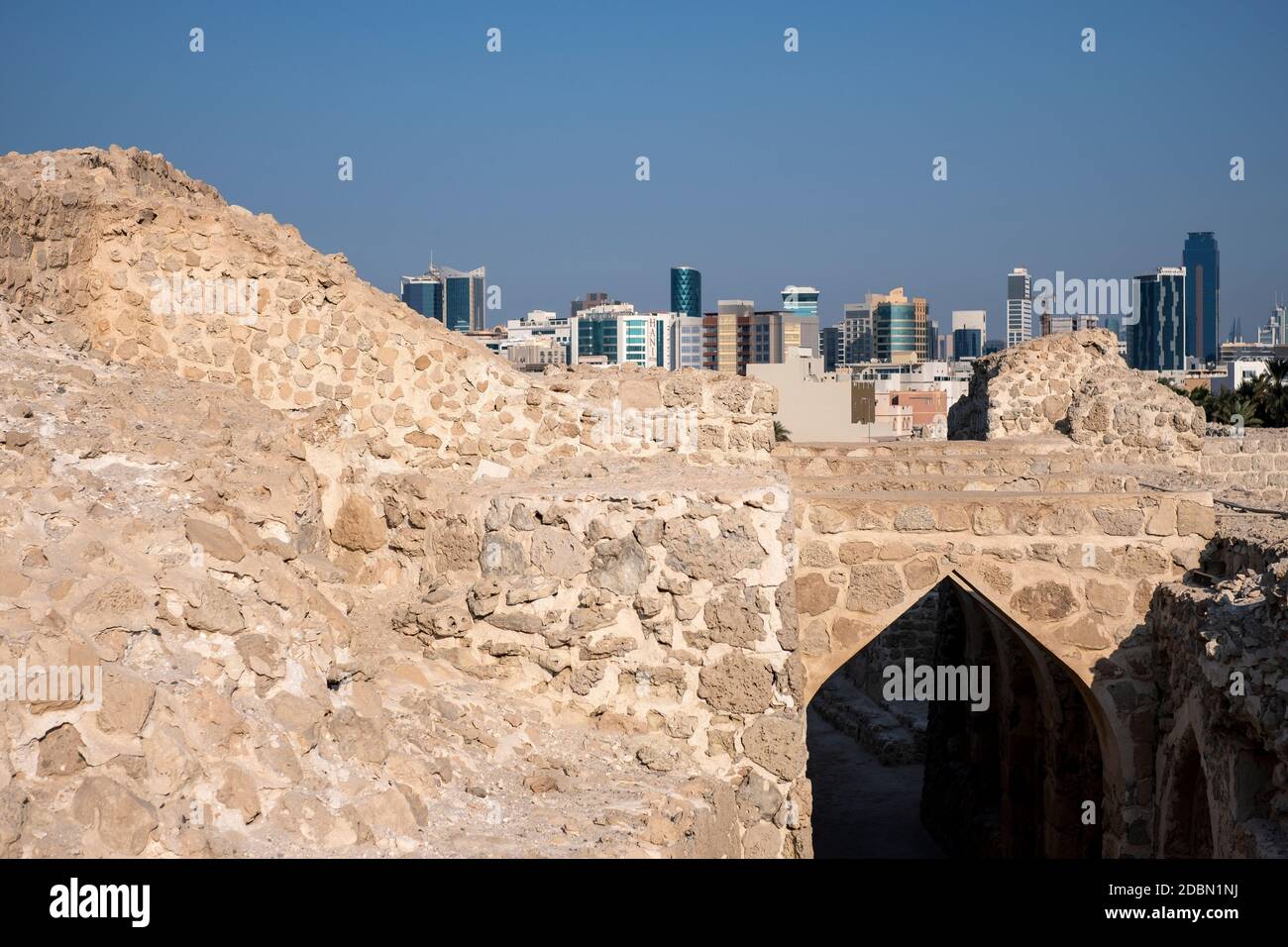 The modern city of Manama, Bahrain viewed from the ruins of the Bahrain ...