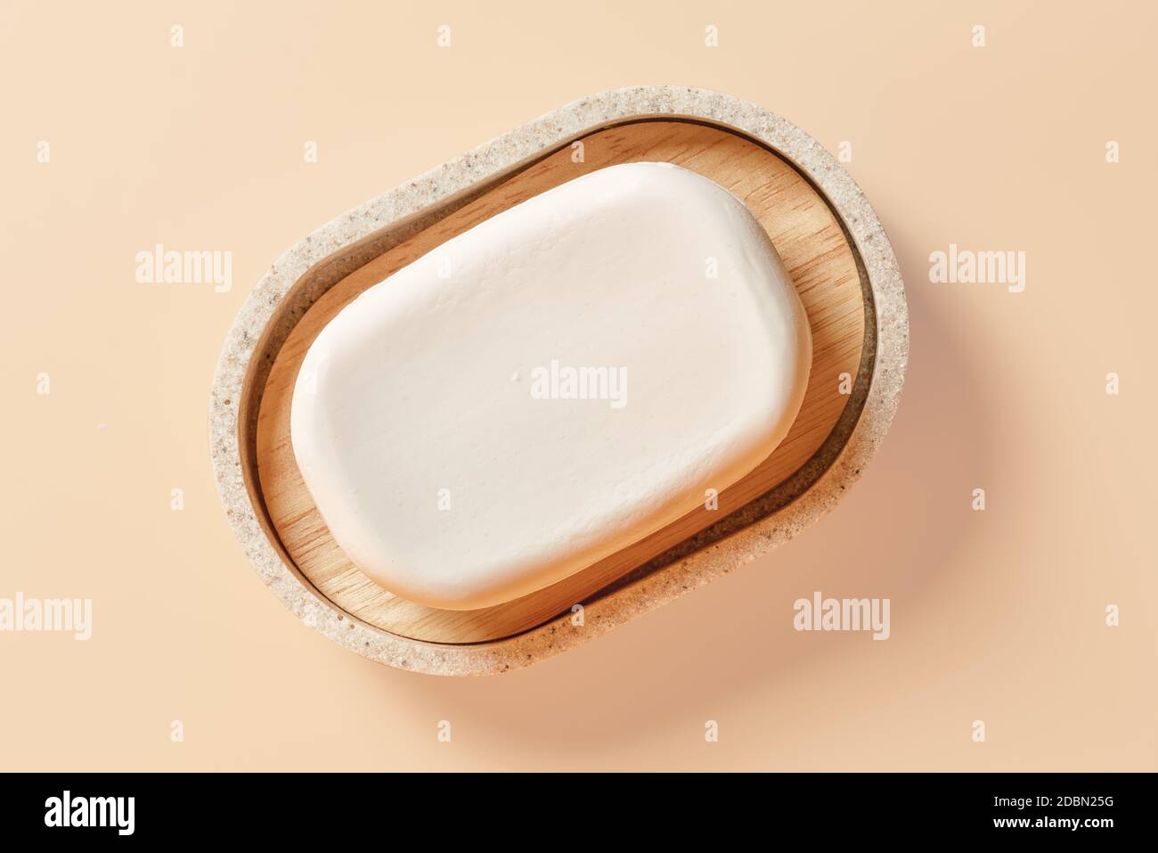 Soap in a soap dish close up. Top view isolated on beige, clipping path ...