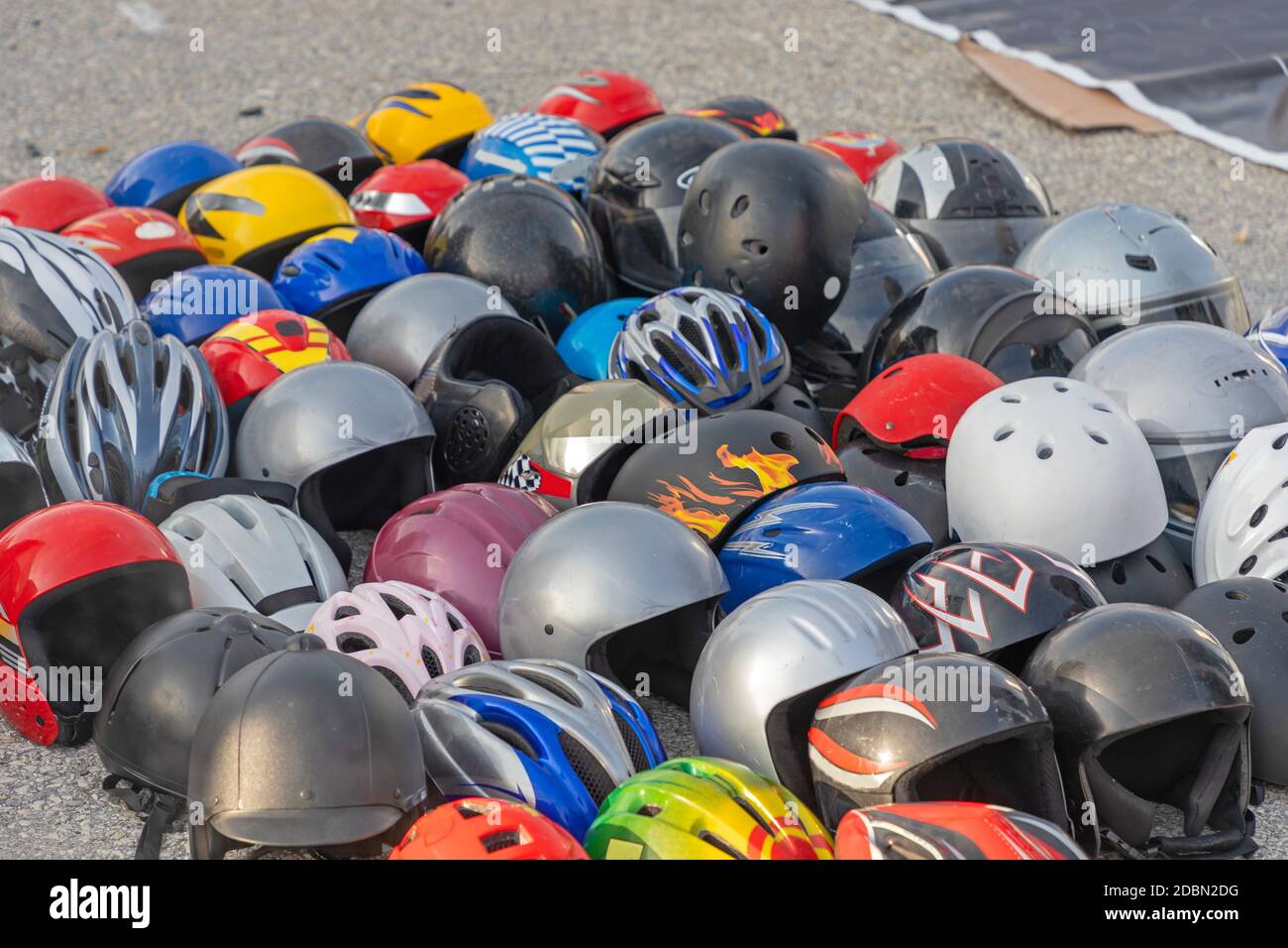 Old used helmets hi-res stock photography and images - Alamy