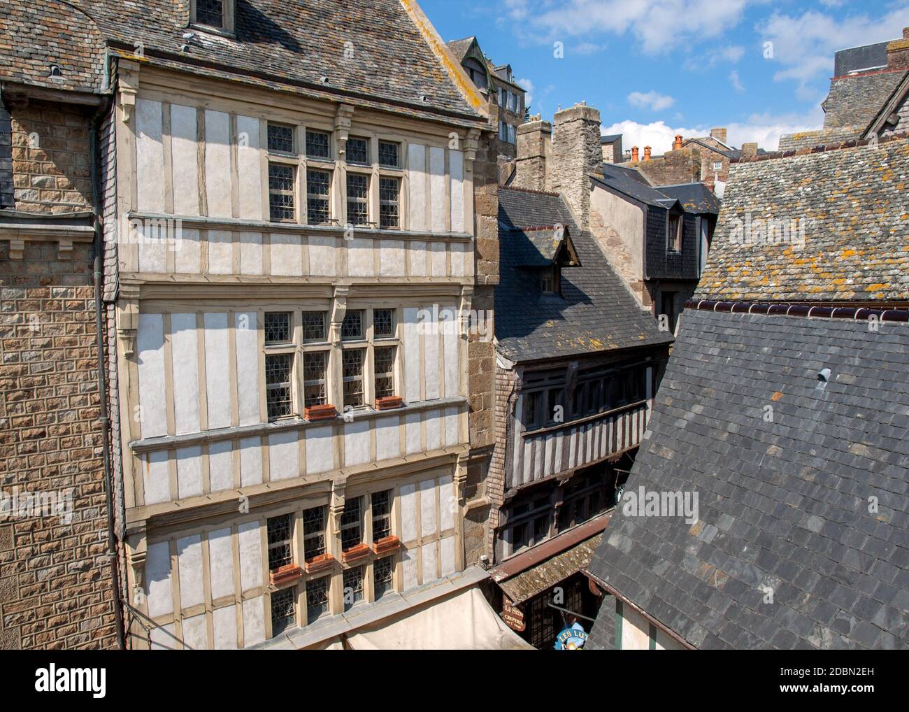 Ancient buildings of the old town on the famous Mont Saint Michel ...