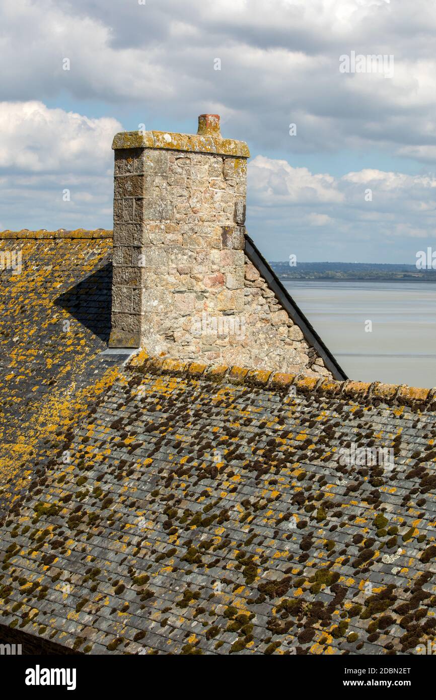 Mont Saint-Michel, the monastery and village on a tidal island between ...