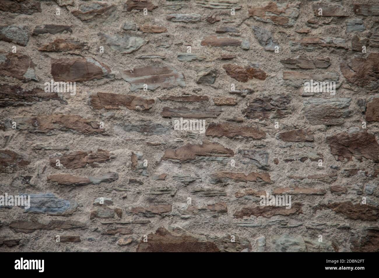 Facade of an ancient masonry made of natural stone Stock Photo - Alamy
