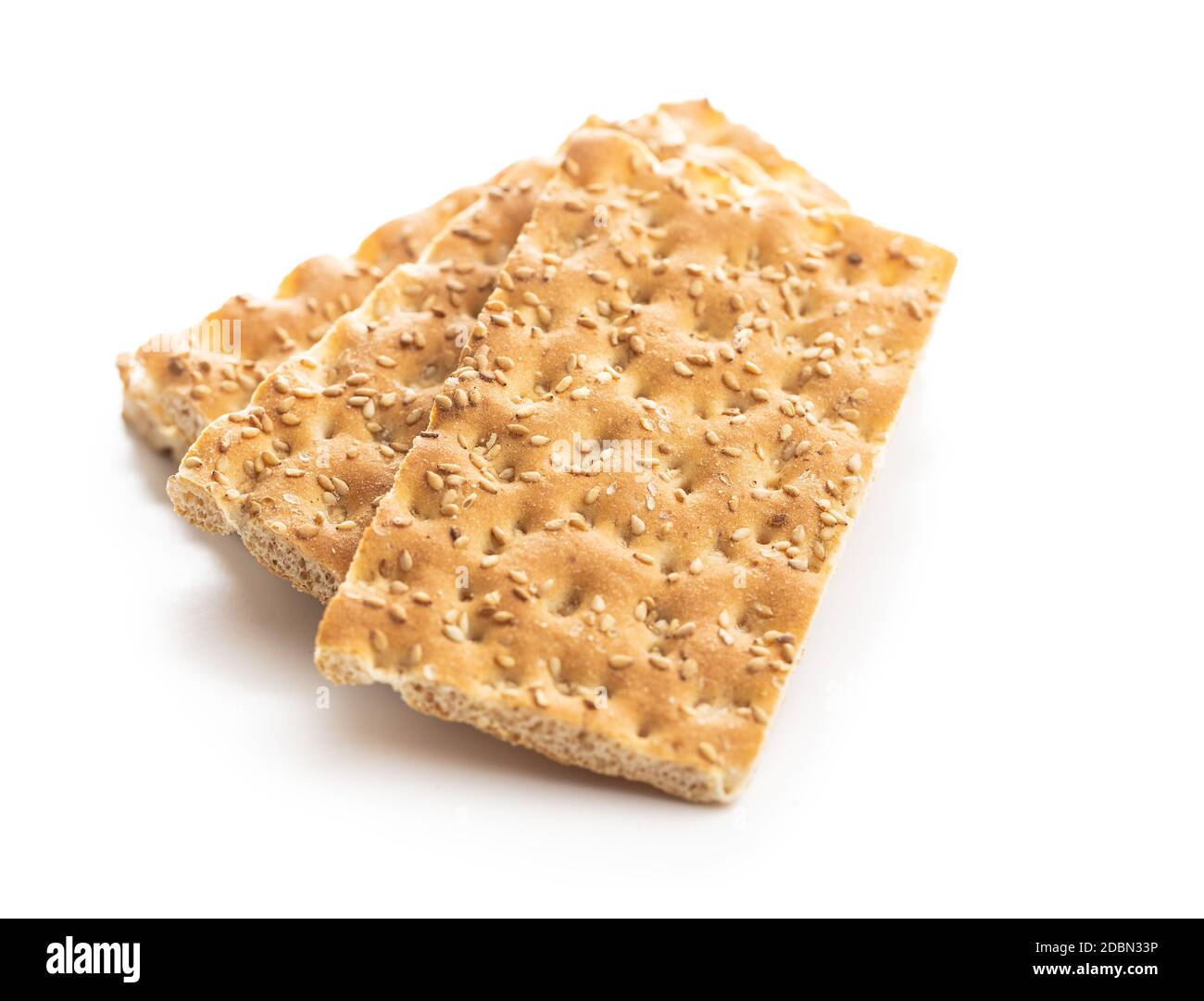 Knackebrot. Wholegrain crispbread with sesame seeds isolated on white ...