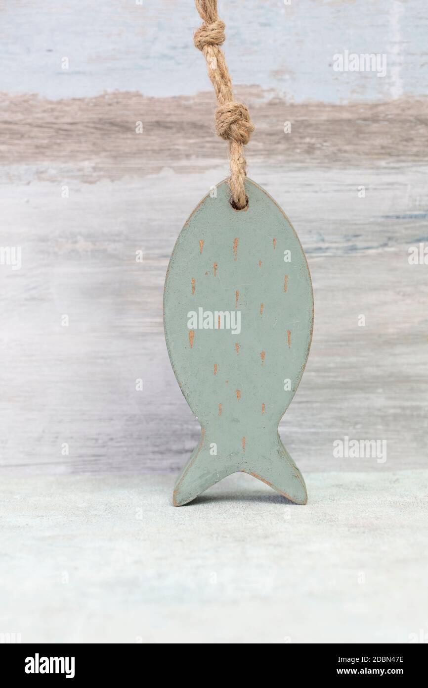 Fish on wooden textured background with copy space, perfect for a ...