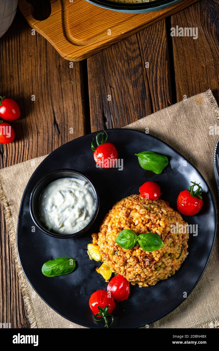 rustic bulgur fried with minced meat and vegetables Stock Photo - Alamy