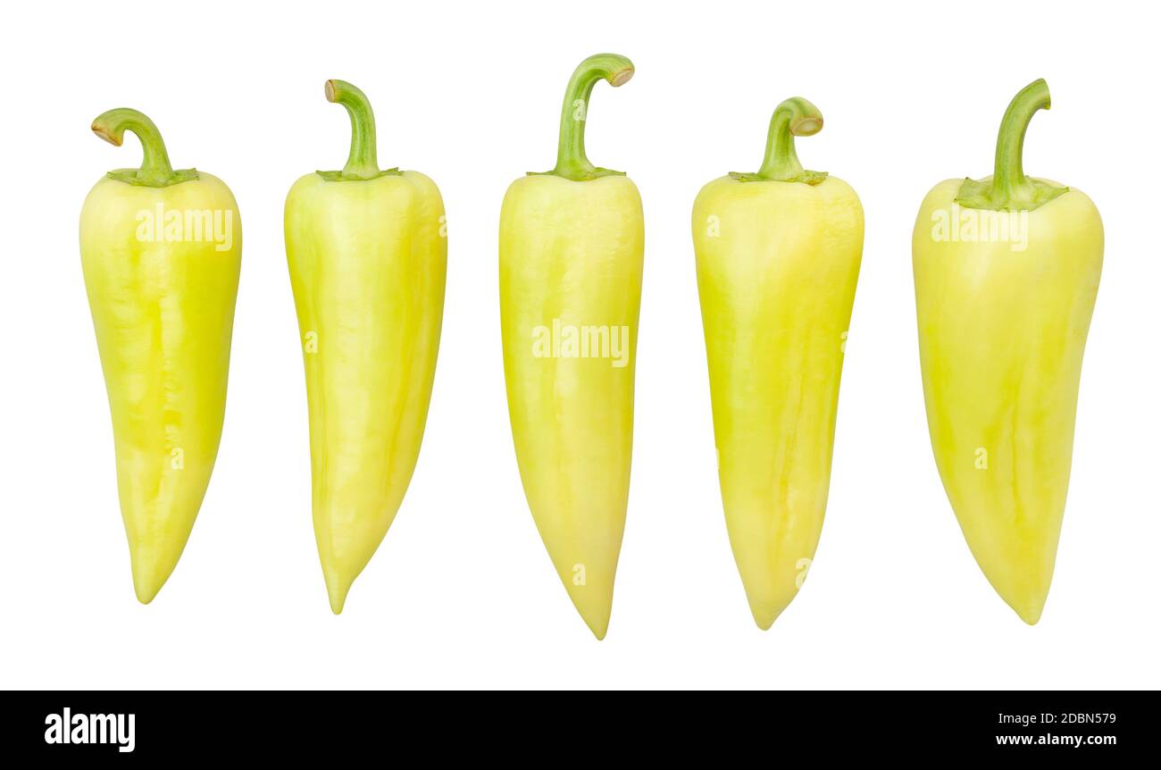 long yellow pepper path isolated on white Stock Photo - Alamy