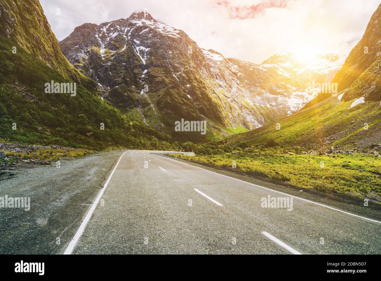 Mountain road up hill in the forest, nature landscape. Shot at Milford ...
