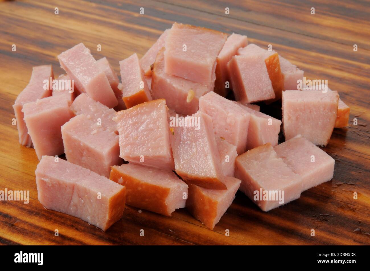 Diced ham on a cutting board Stock Photo - Alamy
