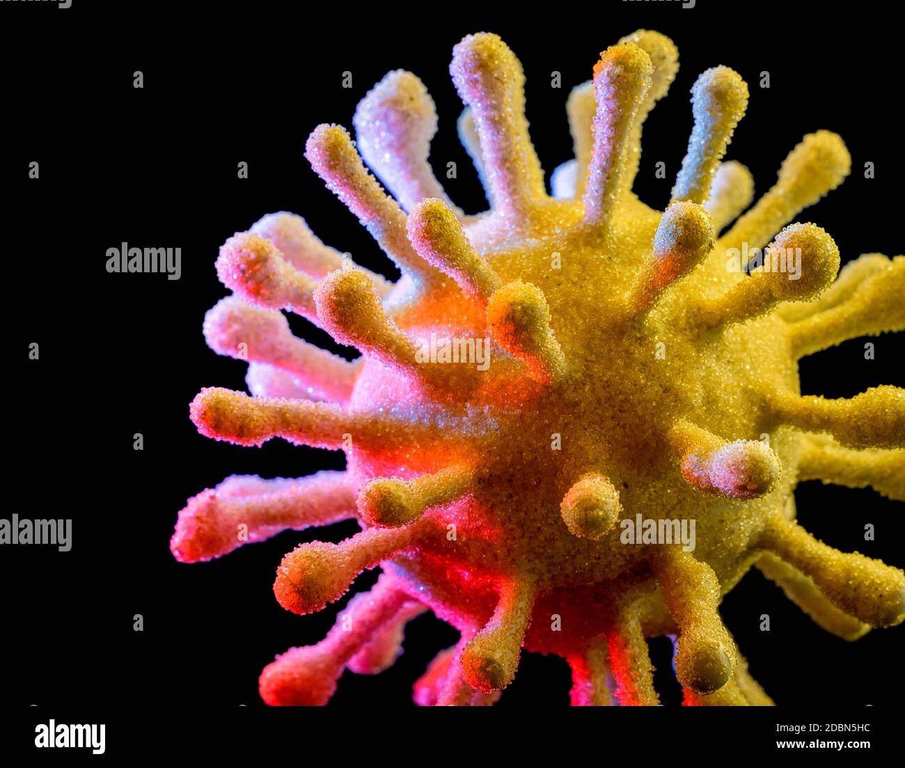 detail of a colorful illuminated symbolic virus in dark back Stock ...