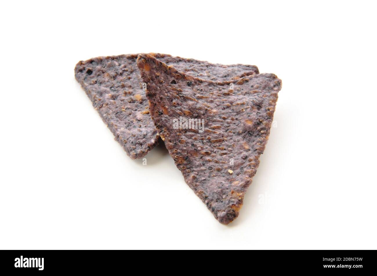 Organic blue corn tortilla chips on a white background Stock Photo - Alamy