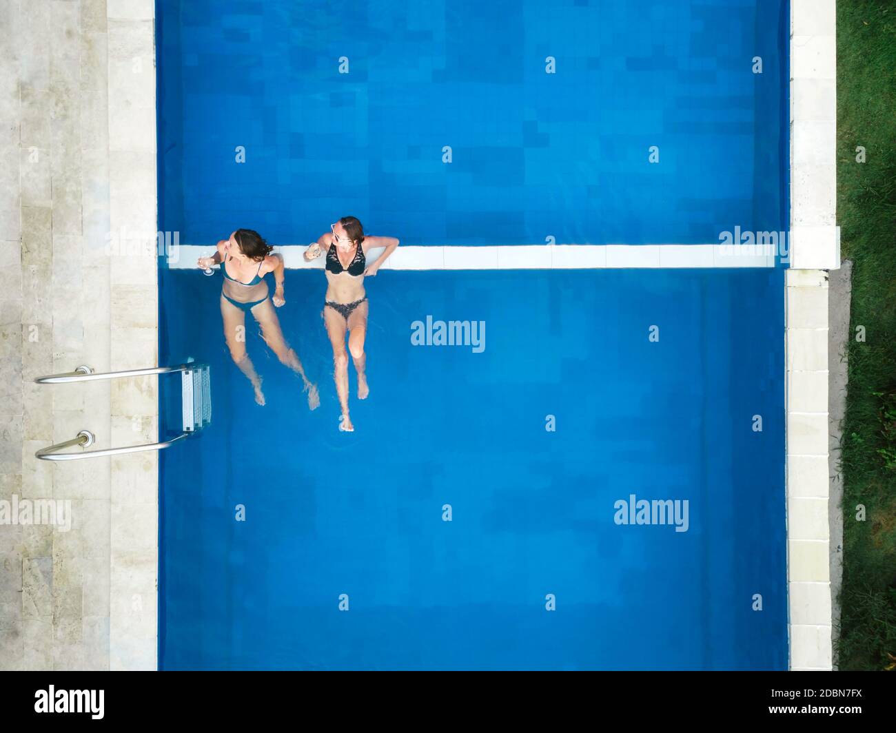 Women in swimming pool in bali hi-res stock photography and images - Alamy