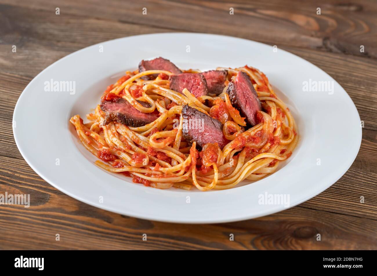 Pasta with sliced beef hi-res stock photography and images - Alamy