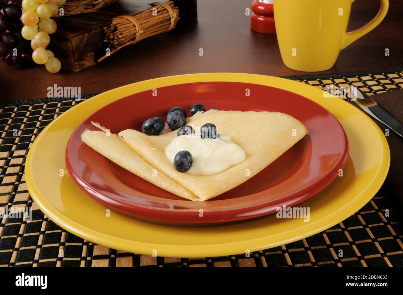 French style crepes with blueberries and vanilla yogurt Stock Photo - Alamy