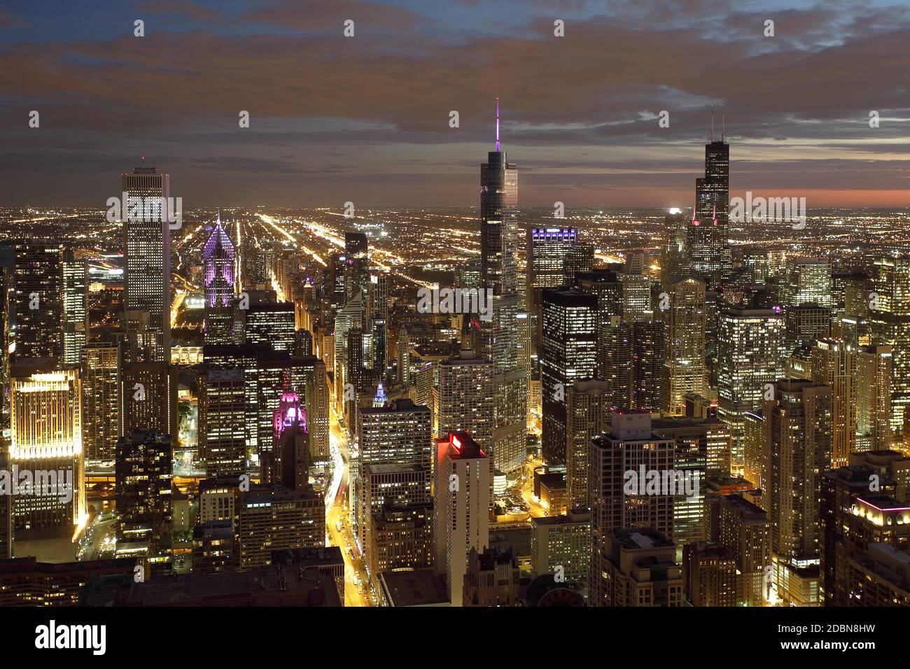 Atmospheric scene of Chicago at night showing Michigan Avenue and ...