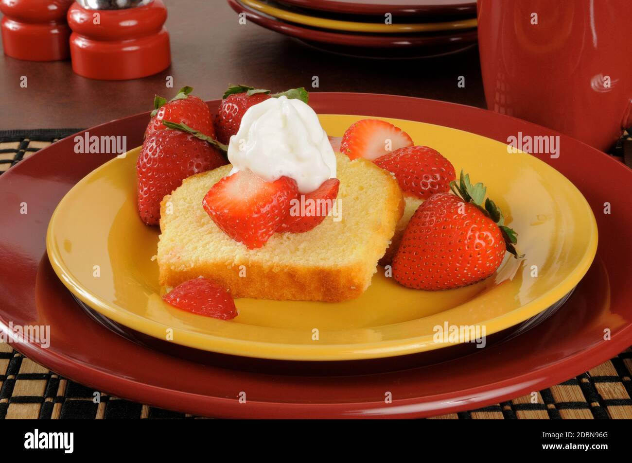 Delicious strawberry shortcake on colorful plates Stock Photo - Alamy