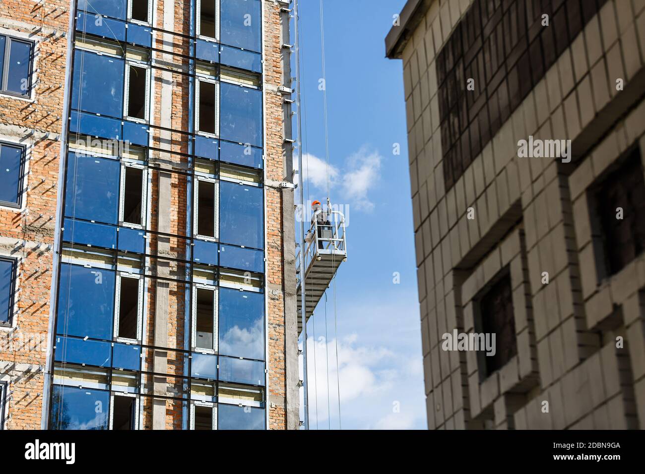 facade window installation construction site Stock Photo - Alamy