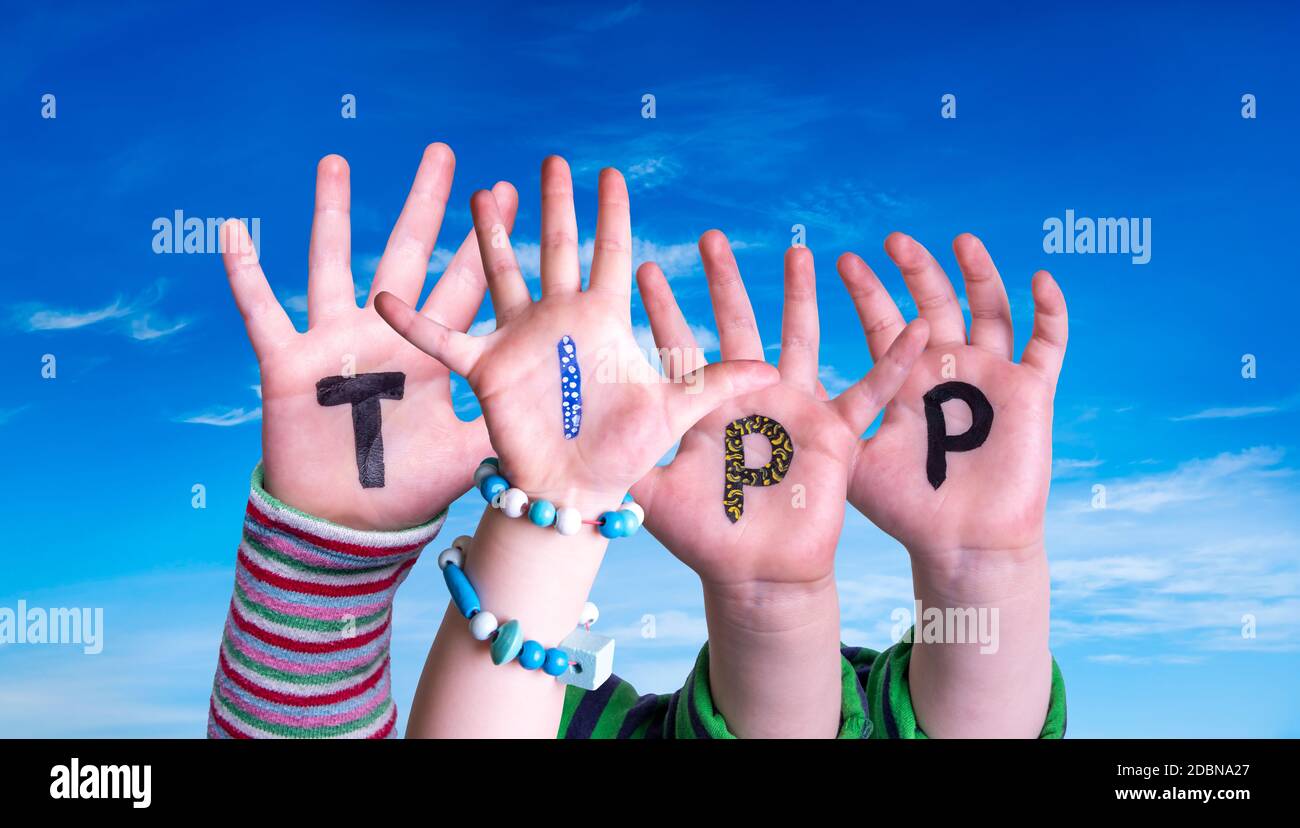 Children Hands Building Colorful German Word Tipp Means Tip. Blue Sky ...
