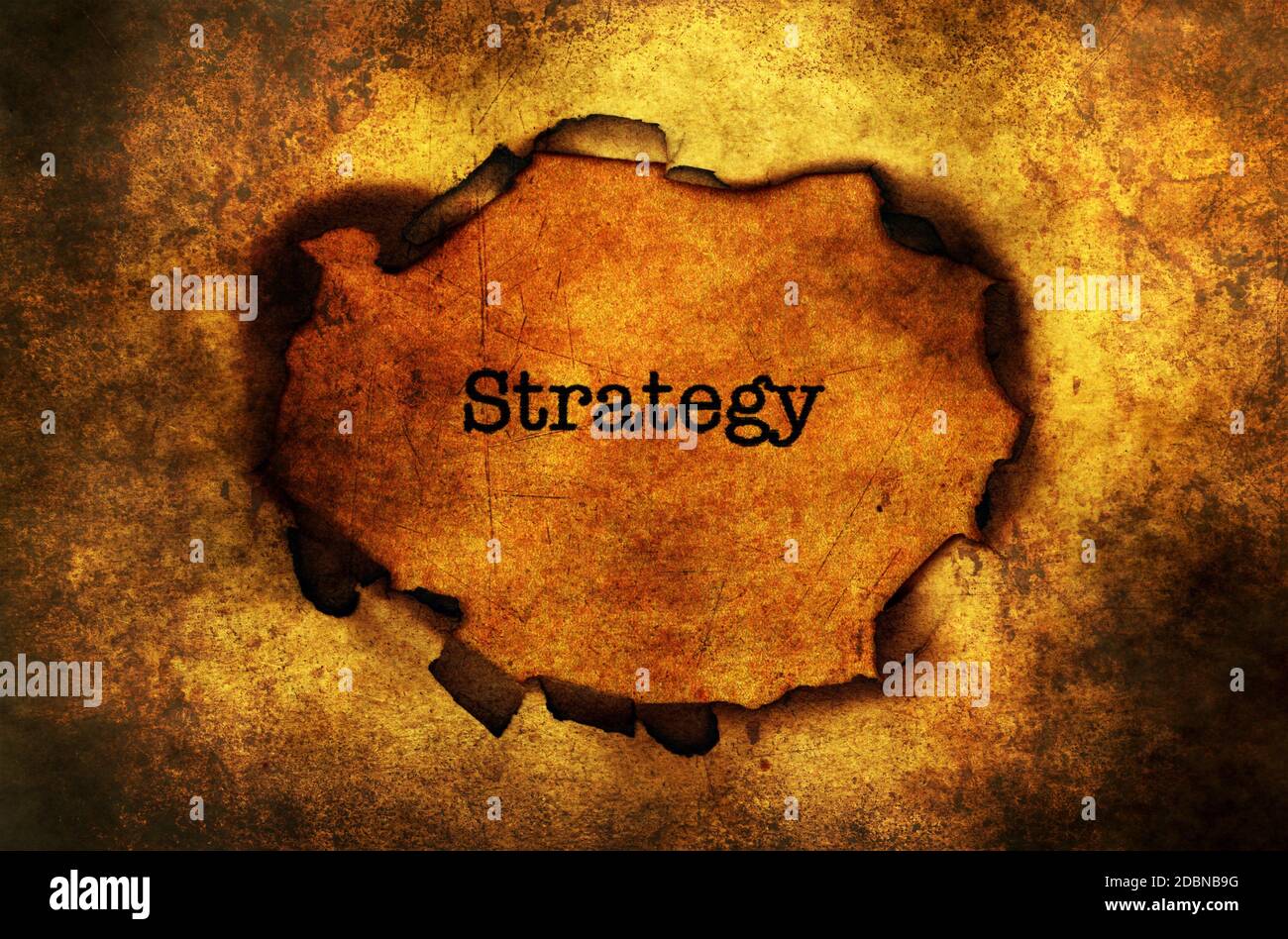 Strategy paper hole grunge concept Stock Photo - Alamy