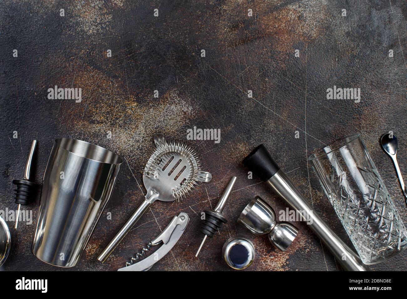 Bartender tools for cocktail making on a dark table top view Stock ...