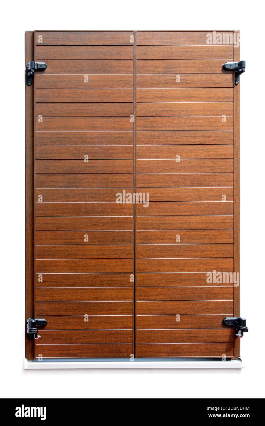 Closed window blinds made from brown wood Stock Photo - Alamy