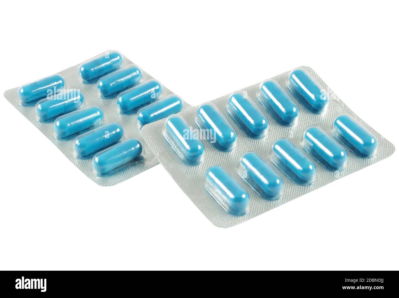 Blue antibiotic pills on white background Stock Photo - Alamy