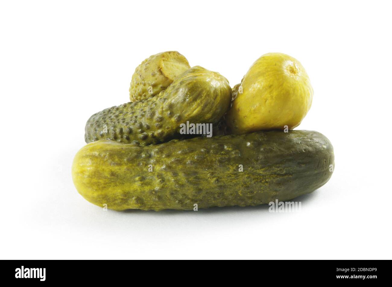 small tasty pickles in brine over white surface Stock Photo - Alamy