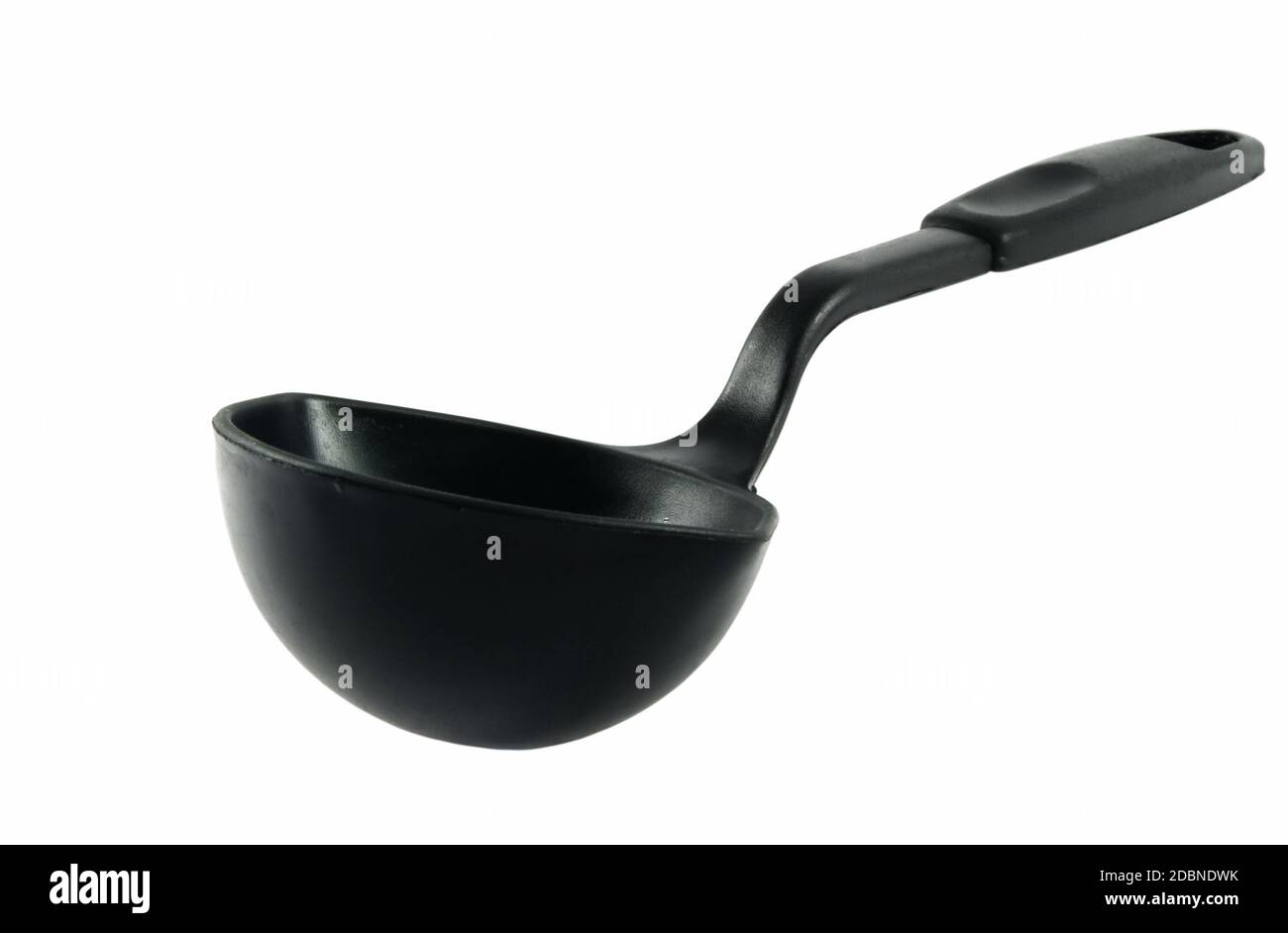 Big black plastic kitchen spoon isolated on white Stock Photo - Alamy