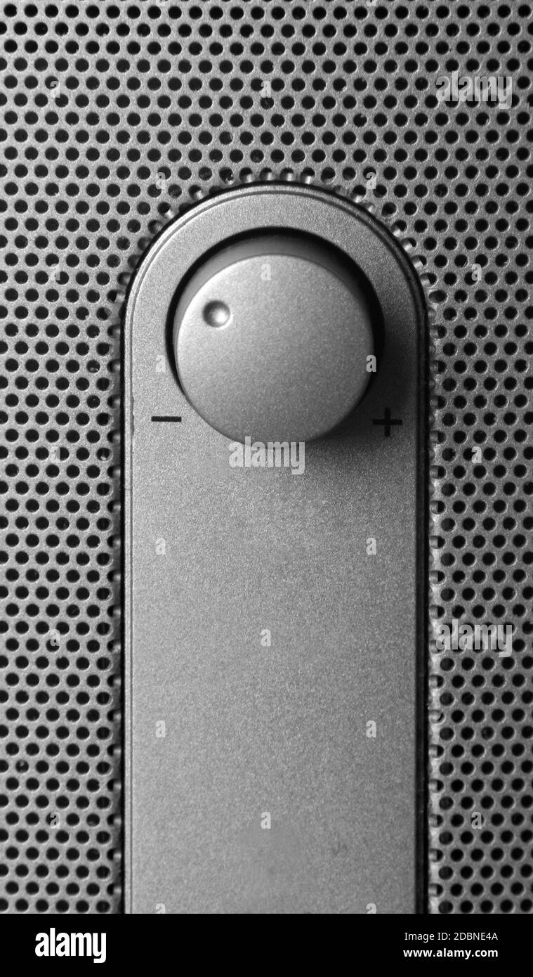 volume switch on metal texture Stock Photo - Alamy