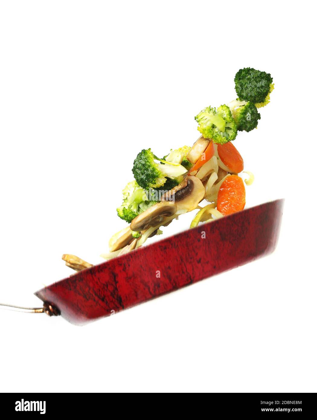 throwing the vegetables. focus on vegetables Stock Photo - Alamy