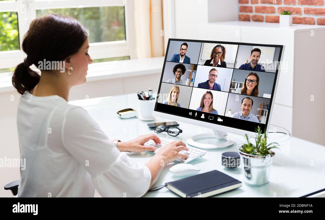 Businesswomen having video conference office hi-res stock photography ...