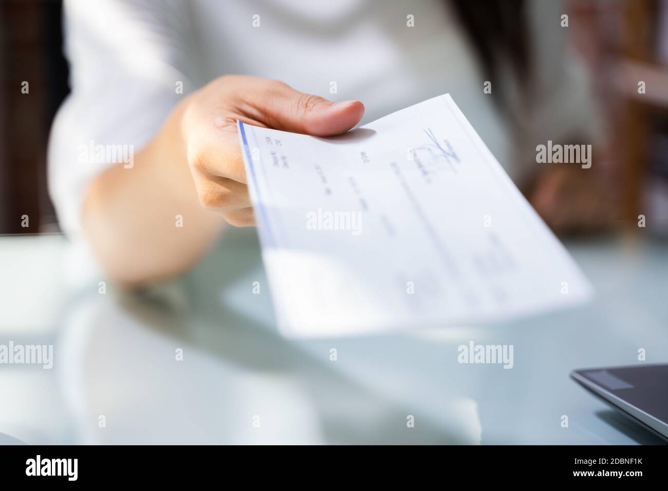 Hand Giving Payroll Compensation Paycheck. Salary Cheque Stock Photo ...
