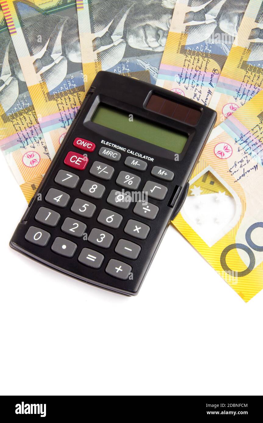 australian money with calculator over white Stock Photo - Alamy