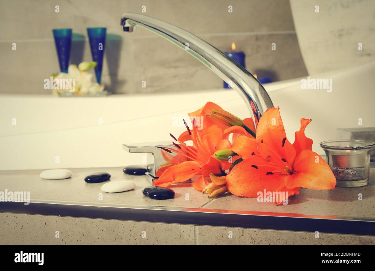 water tap with flowers in spa salon.shallow DOF Stock Photo - Alamy