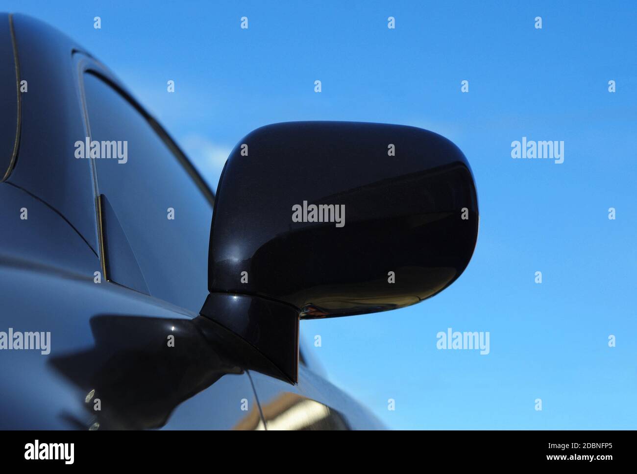 modern car mirror closeup on sky background Stock Photo - Alamy