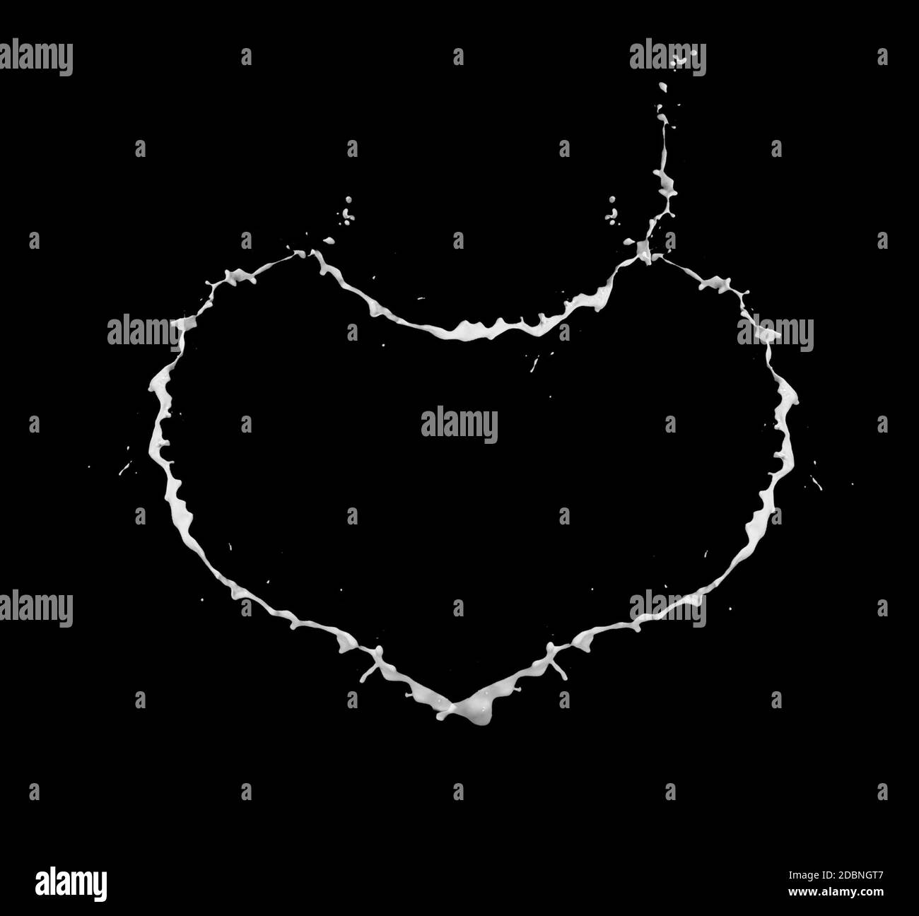 milk splash in heart shape isolated over black background Stock Photo ...