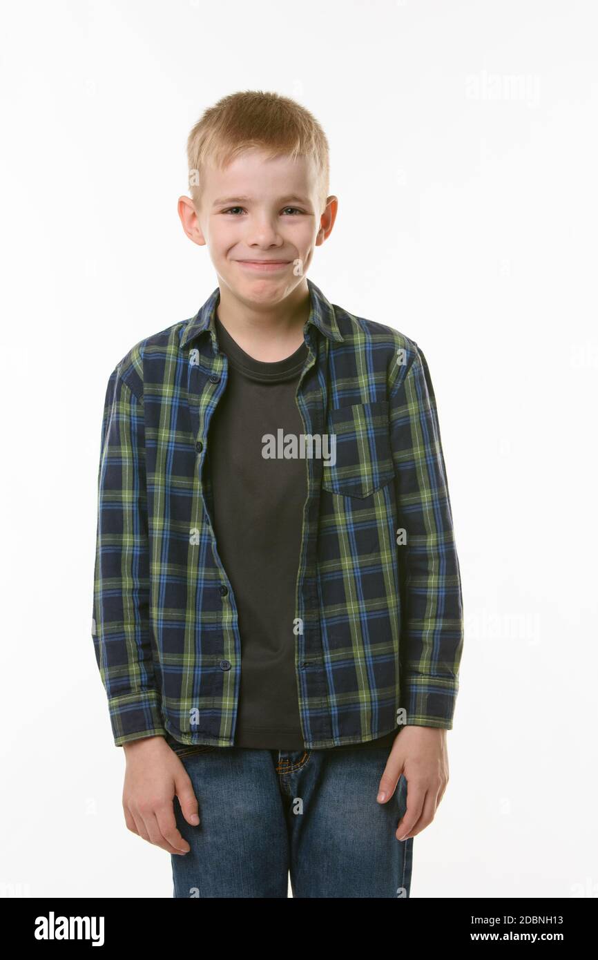Portrait of a laughing young man of ten years on a white background ...